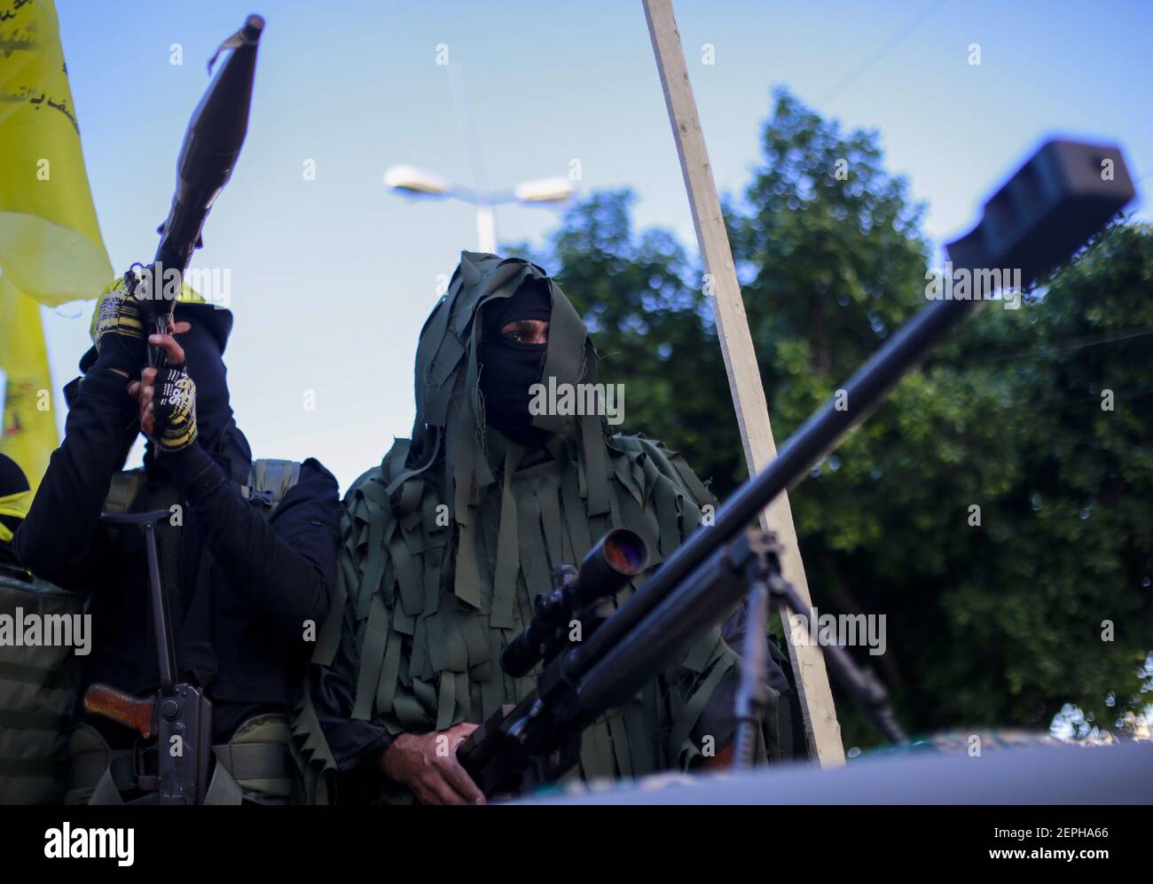 A fighter from the Al-Aqsa Martyrs Brigades during the 55th anniversary ...
