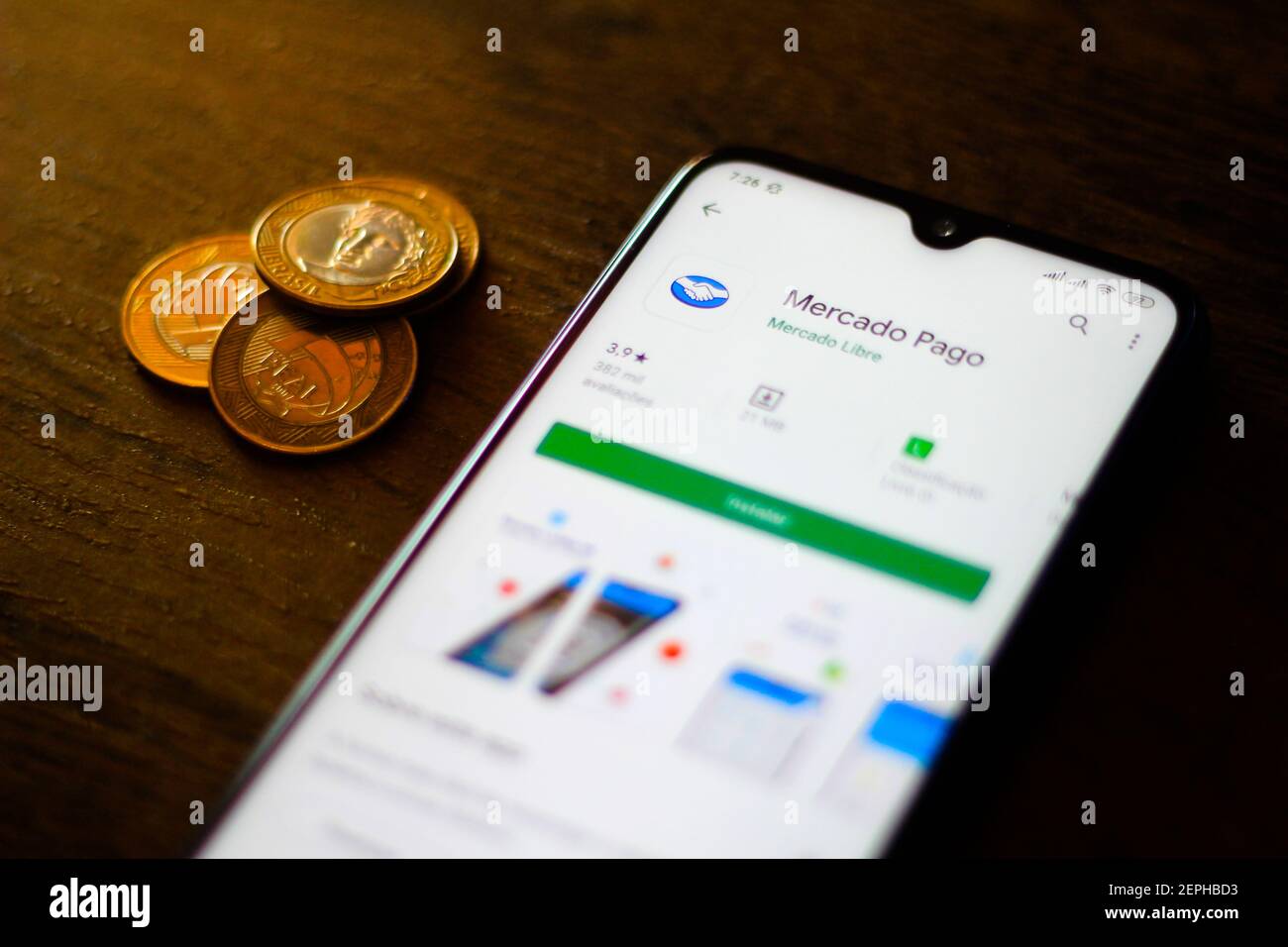 In this photo illustration the MercadoPago logo and app is seen ...