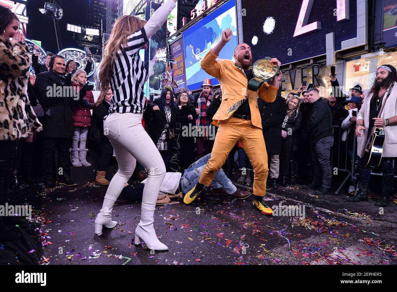 NEW YORK CITY - DECEMBER 31: (L-R) Co-host Maria Menounos and WWE stars ...