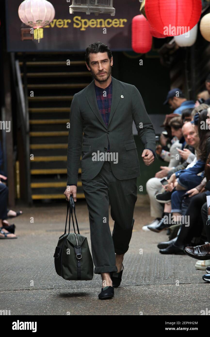 A model showcases during a catwalk show at Oliver Spencer show, London ...