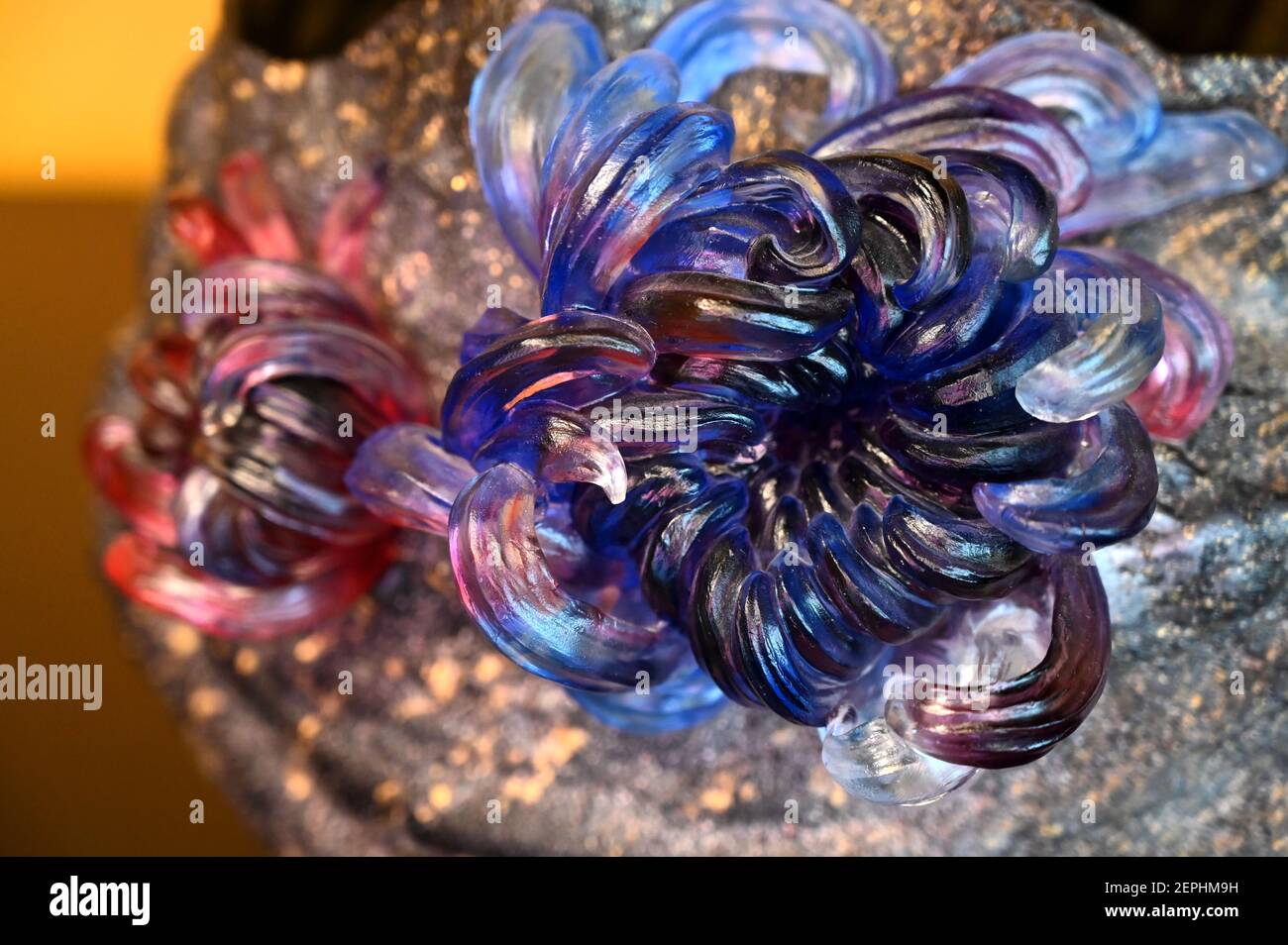 --FILE--Artworks made of liuli, colored glaze, which resemble flowers ...