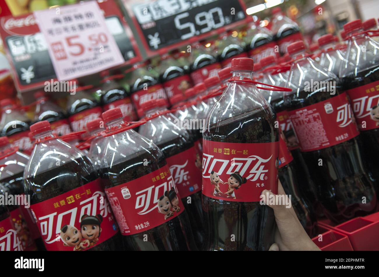 Creative photo: in this unlocated photo, a great number of bottled Coca ...