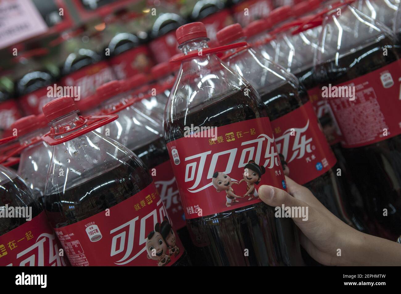 Creative photo: in this unlocated photo, a great number of bottled Coca ...