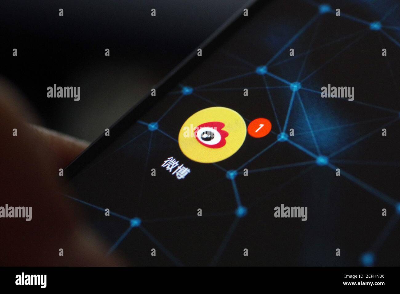 Creative photo: The logo of Sina Weibo, a Chinese microblogging (weibo) website similar to ...