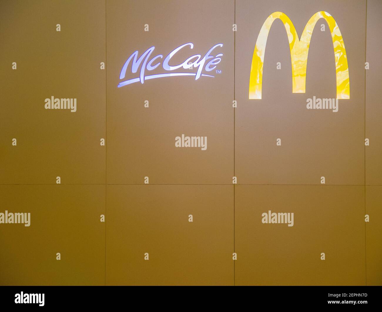 The logo of McCafe, a coffee-house-style food and beverage chain, owned ...