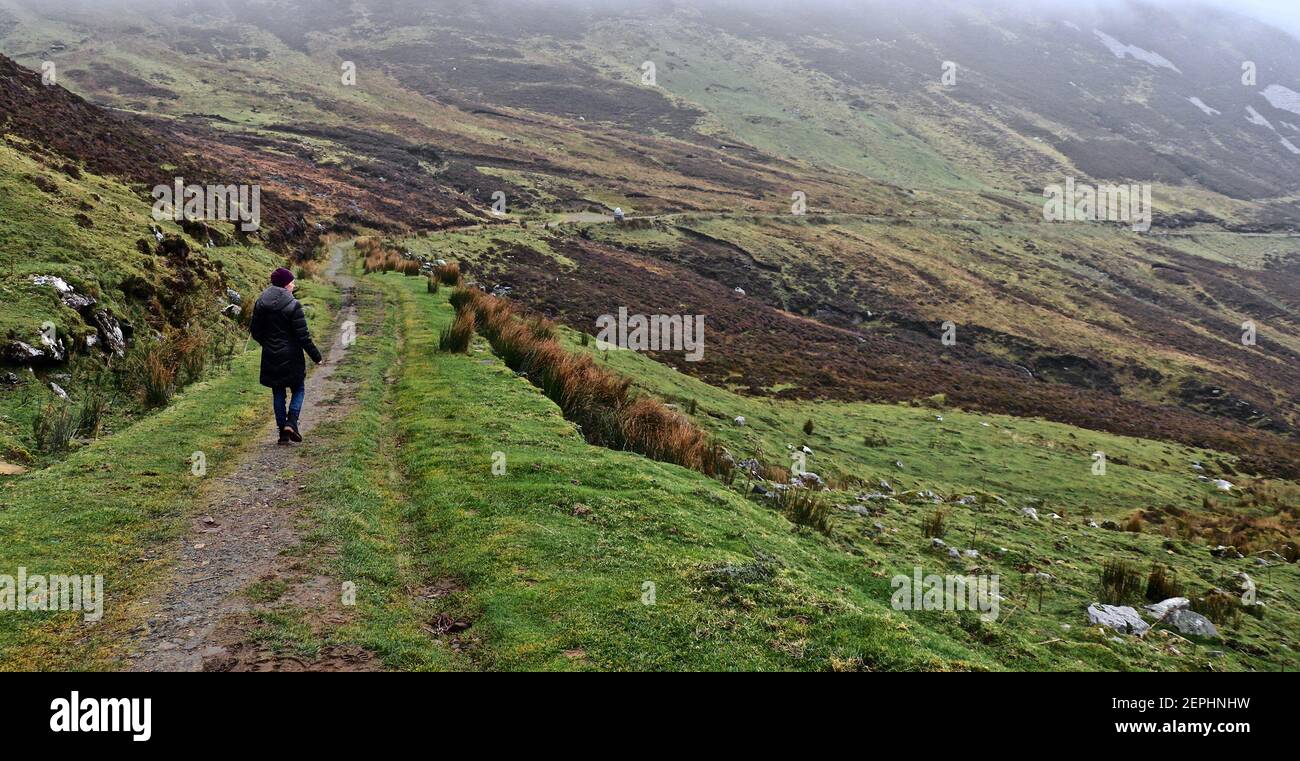 The writer's wife, Mary Carpenter, walks along the Pilgrims Path near ...