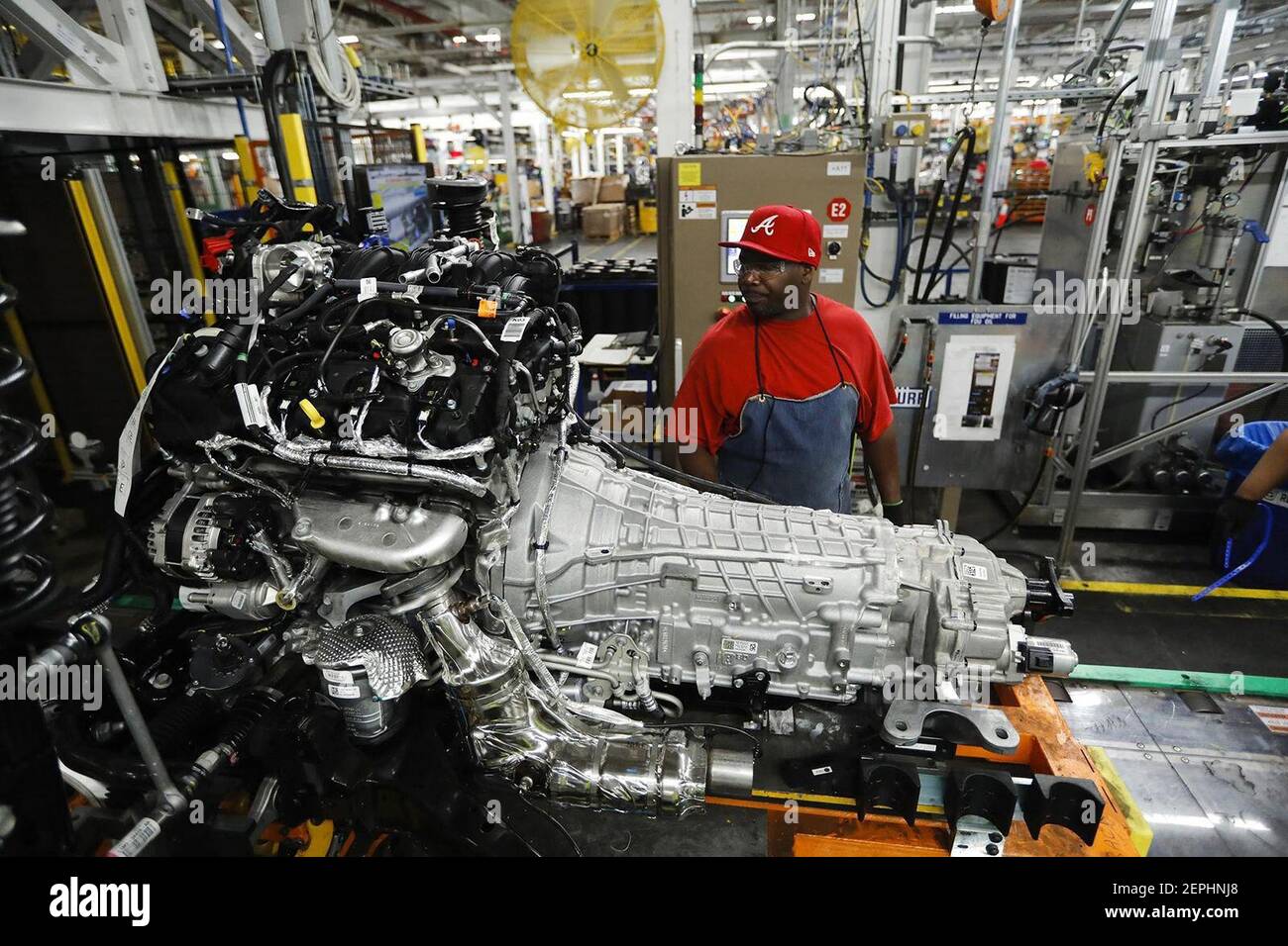 Workers on the assembly line at the Ford Chicago Assembly Plant, where ...