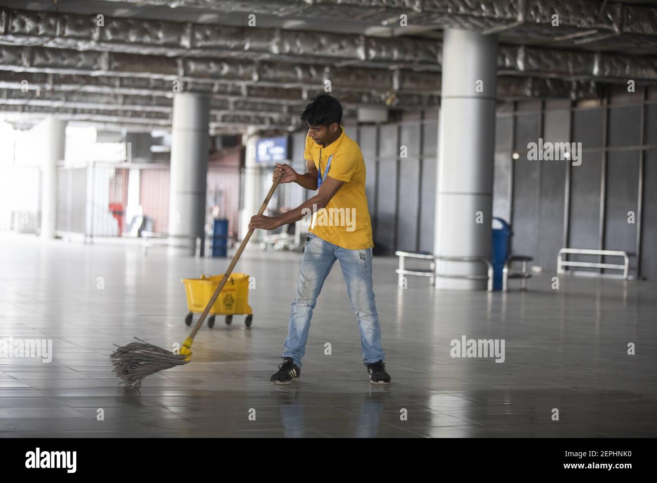 Cleaning personal clean the airport departure lobby to protect against ...