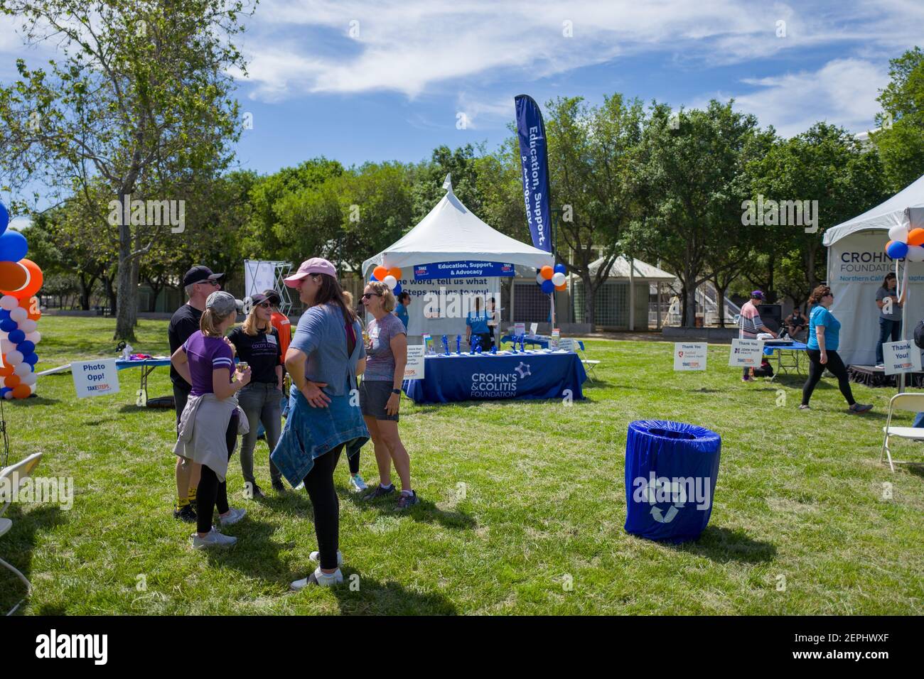 Walkers gather outdoors at the Take Steps Silicon Valley charity walk ...