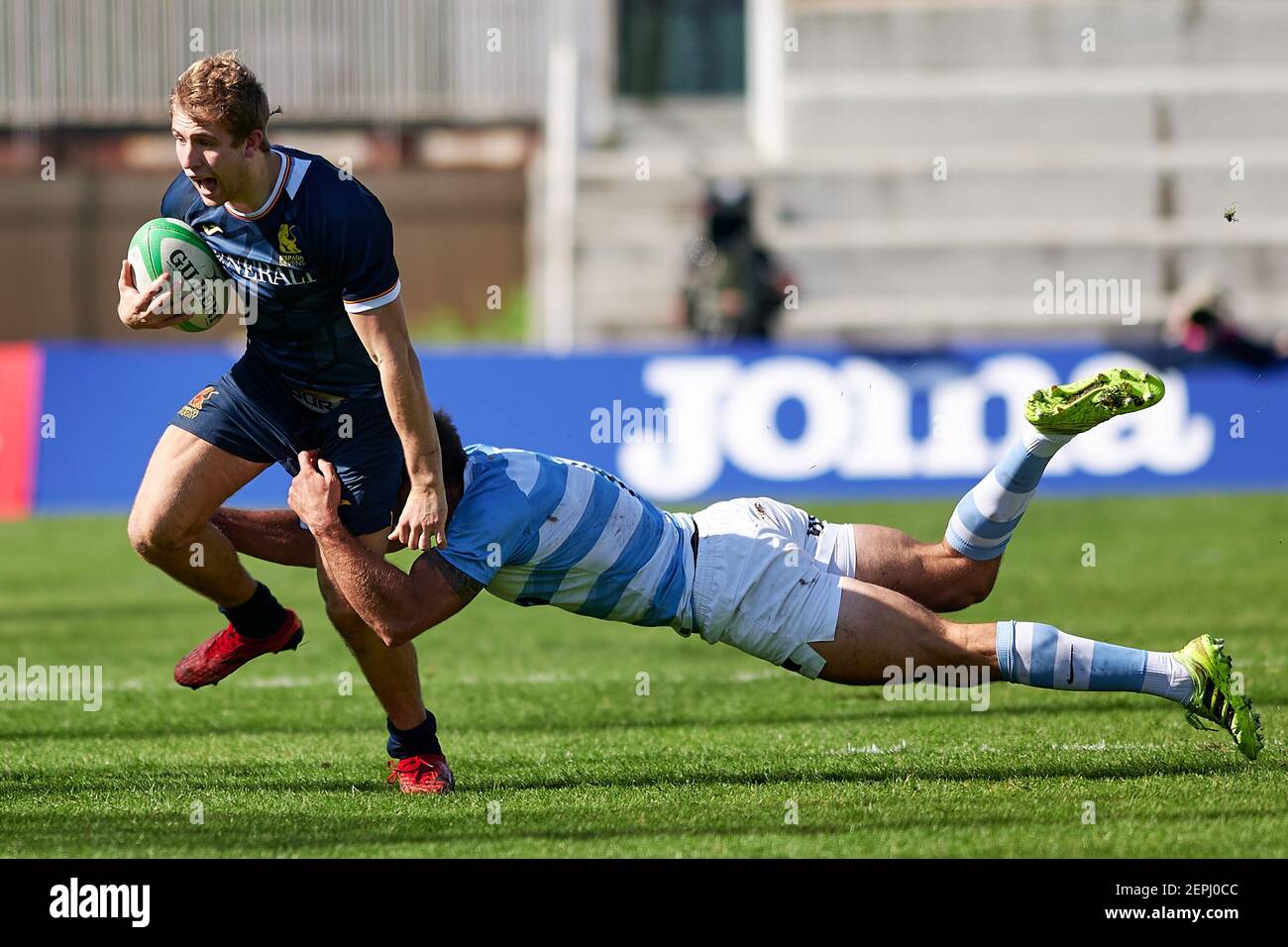 Players In action during the Madrid Rugby 7s match between Spain and ...