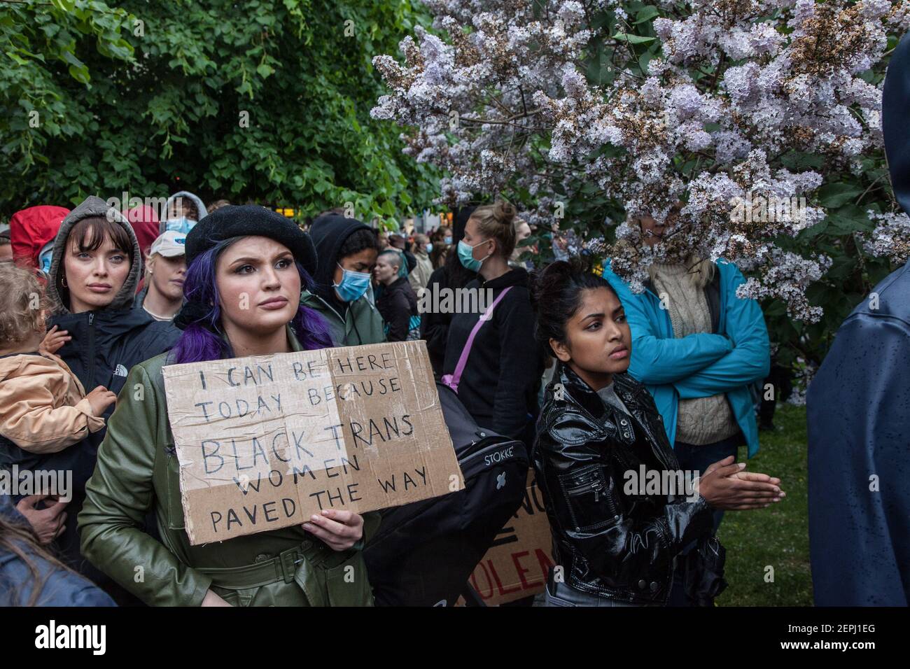 A protester holding a BLM placard during the demonstration. Hundreds of ...