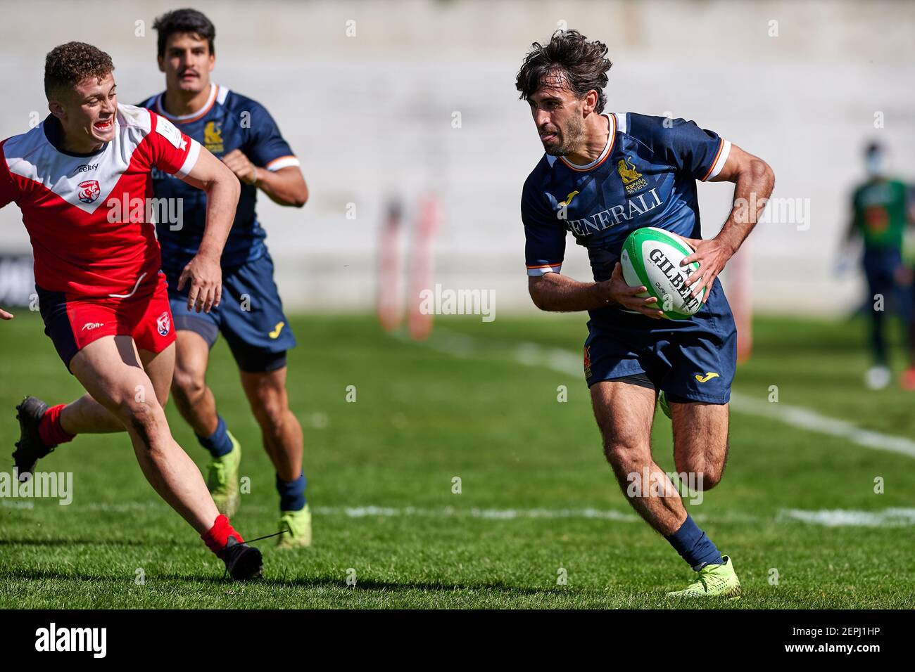 Players In action during the Madrid Rugby 7s match between Chile and ...