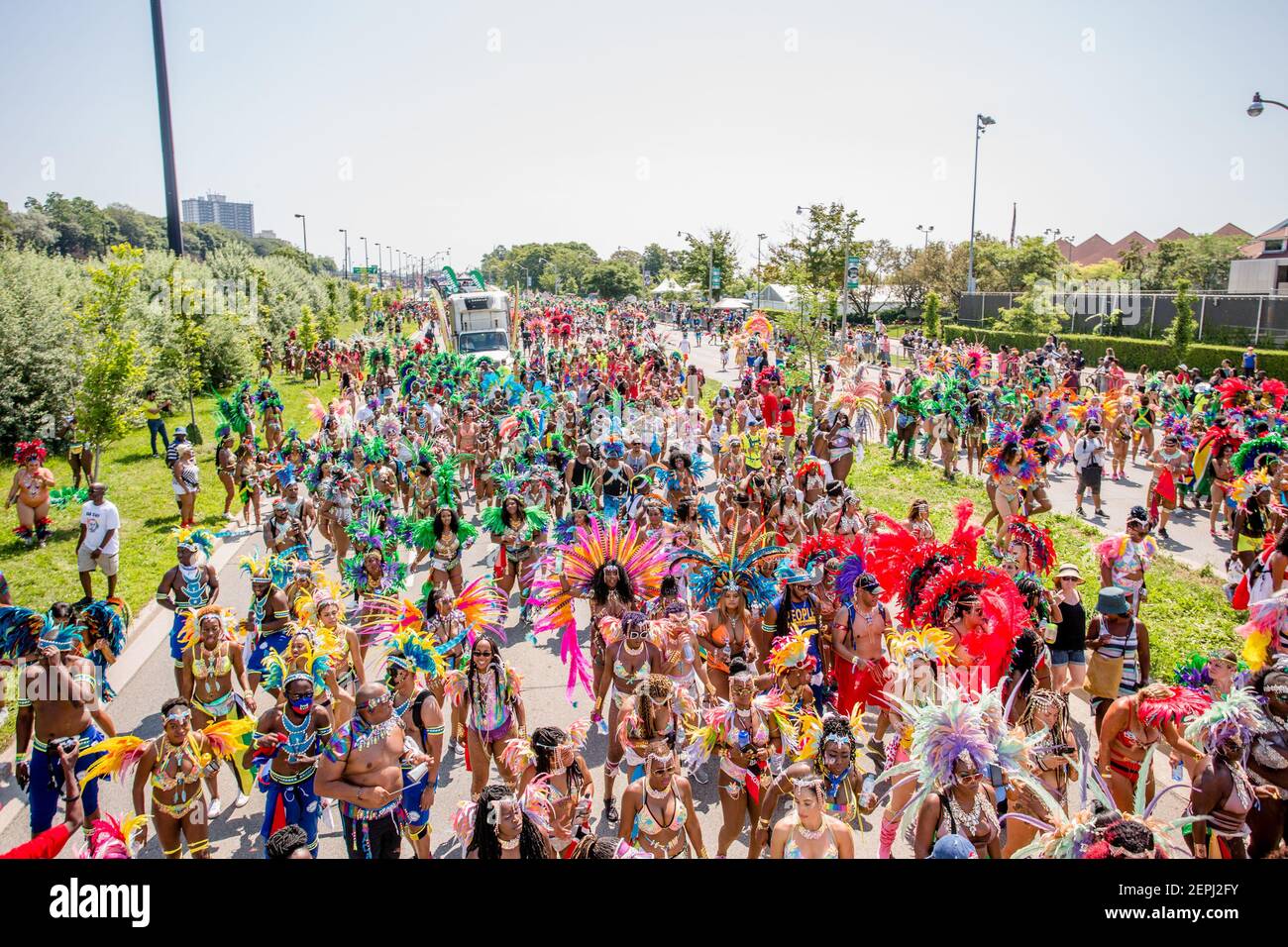 Participants parading in colourful costumes during the Toronto ...
