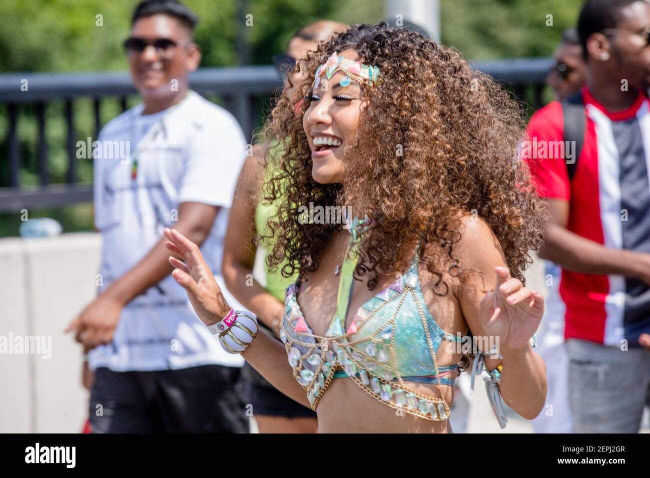 A participant parading in a colourful costume during the Toronto Caribbean Carnival Grand Parade ...