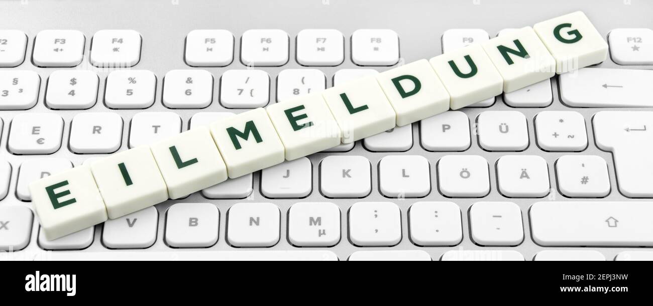 German Breaking News and PC Keyboard close up Stock Photo - Alamy