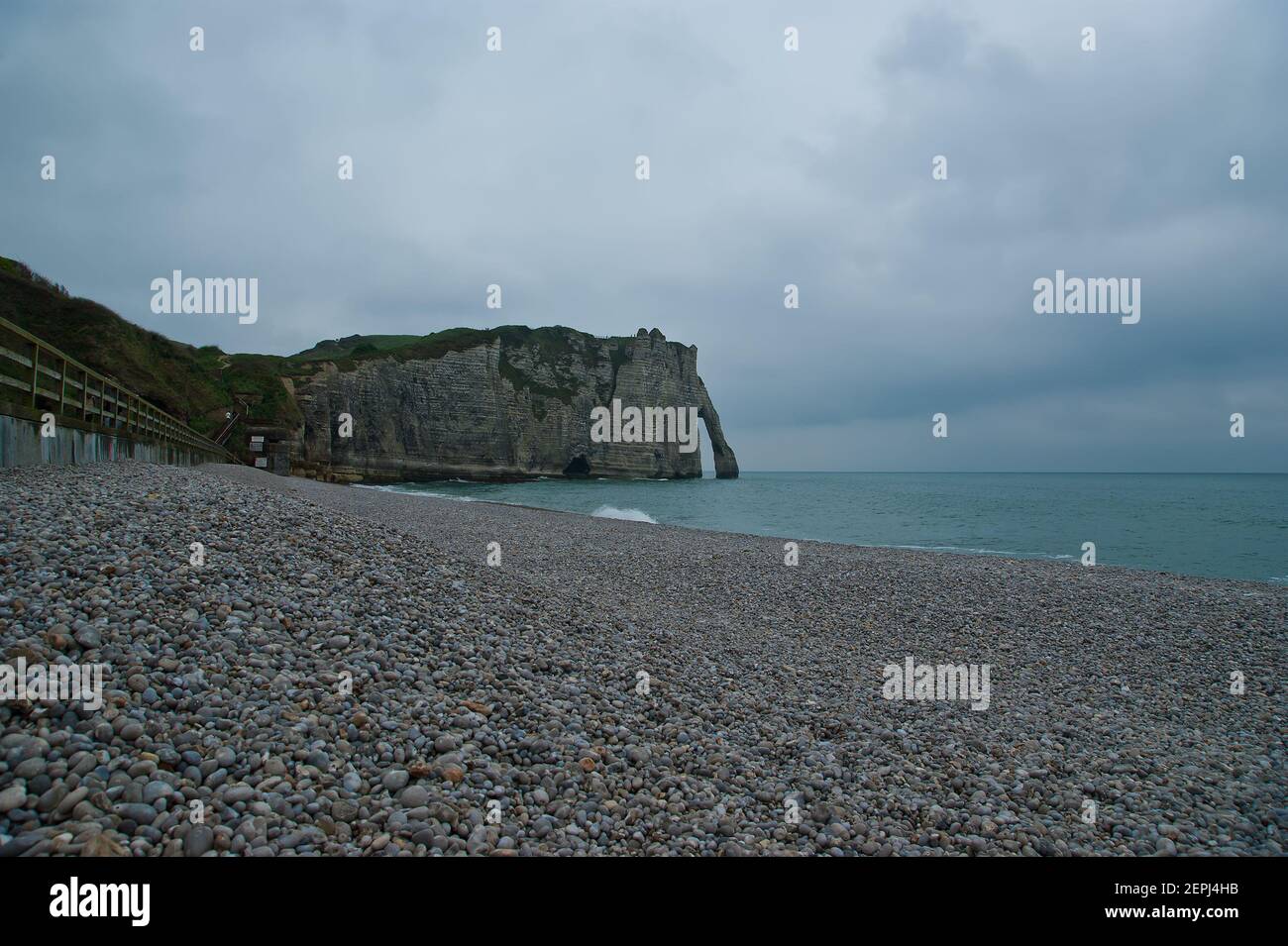 white cliffs and natural arches at Etretat in French Normandy Stock ...
