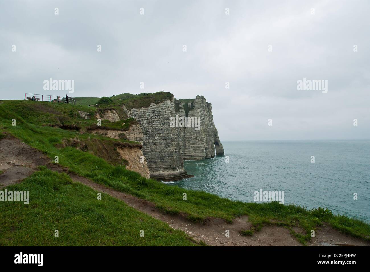 white cliffs and natural arches at Etretat in French Normandy Stock ...