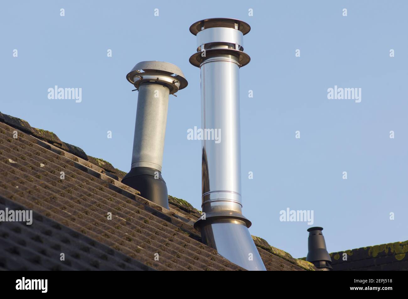 Closeup of a chimney system of a house Stock Photo - Alamy
