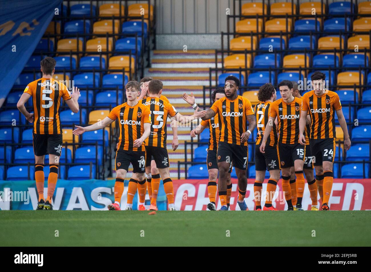 Hull players celebrate after Josh Magennis scores his side's first goal ...
