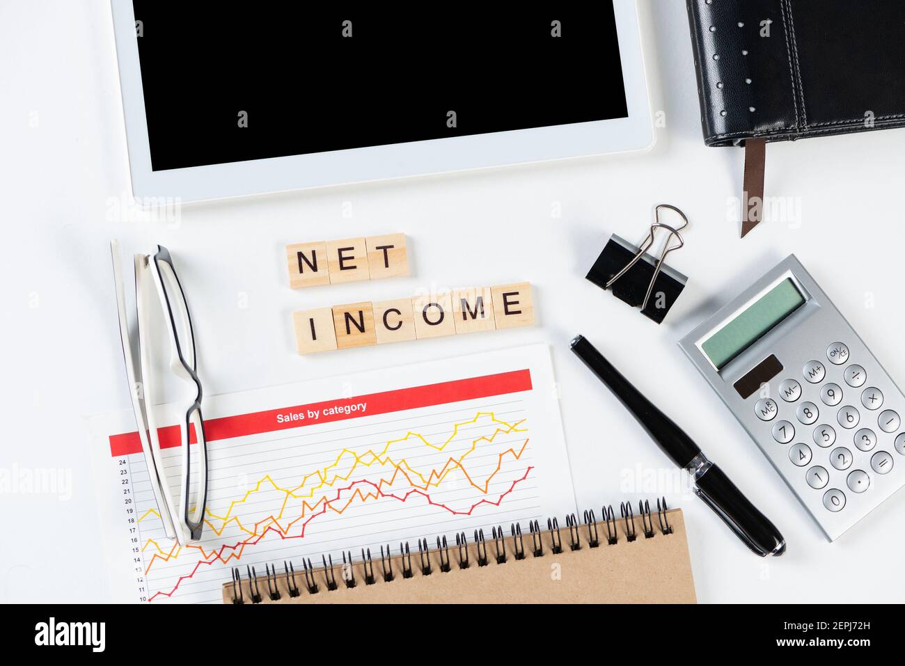 Net income concept with letters Stock Photo - Alamy
