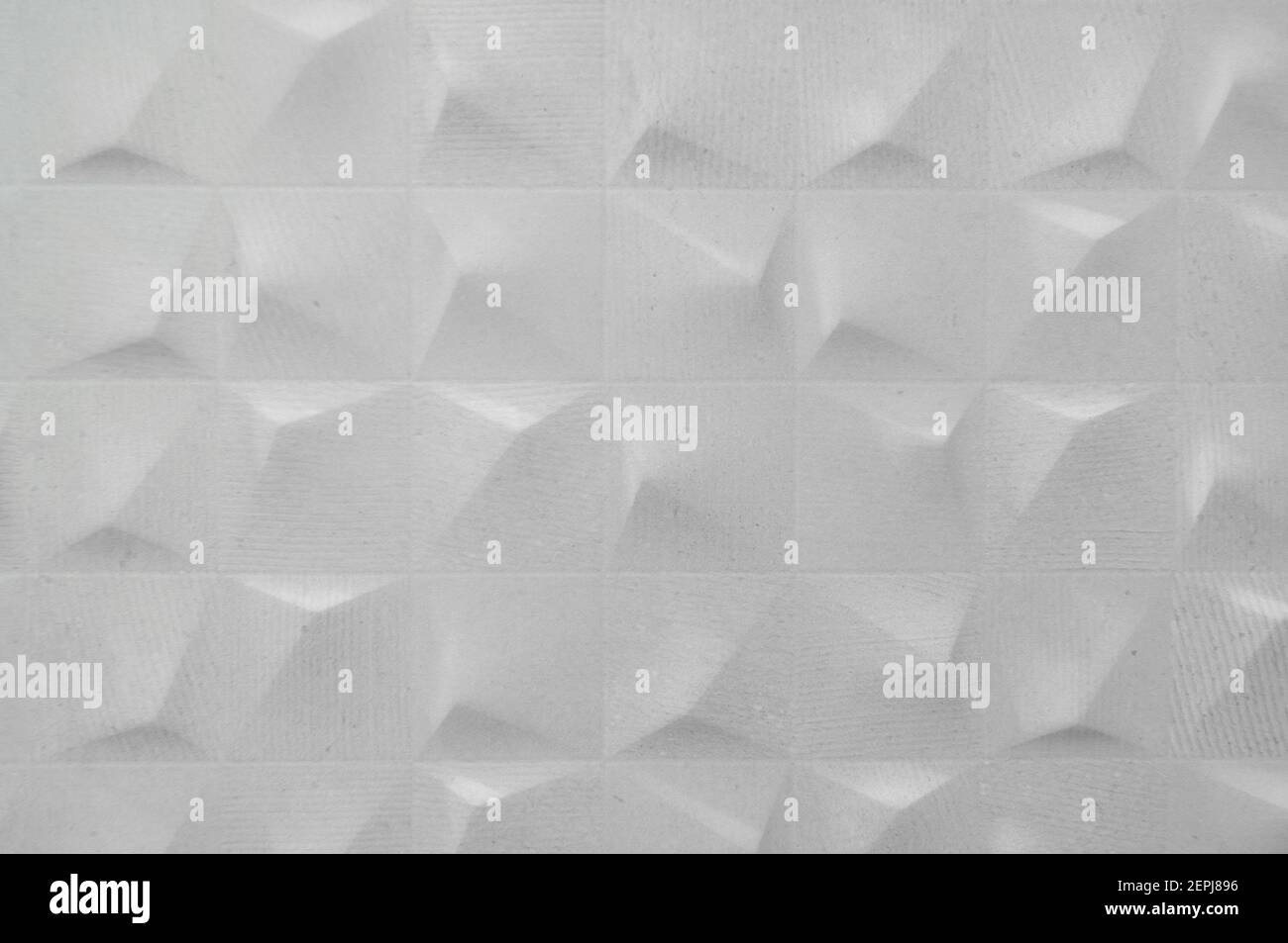 Abstract, three-dimensional background in gray and white. The division ...