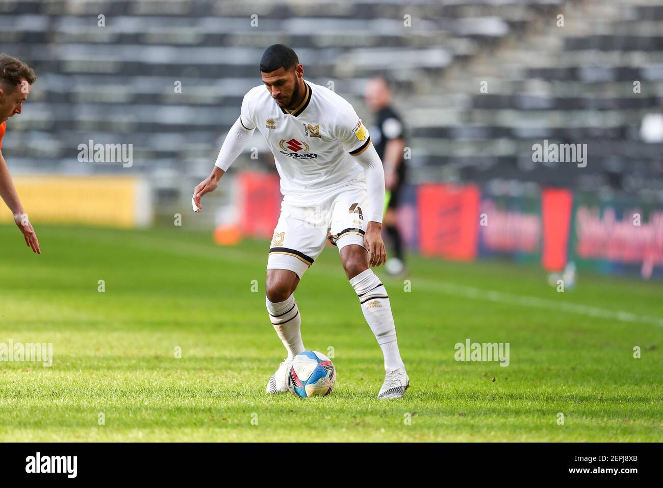 MILTON KEYNES, ENGLAND. FEB 27TH Milton Keynes Dons Zak Jules during ...