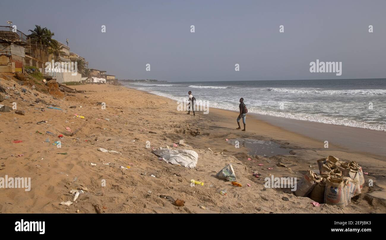 Monrovia Liberia Atlantic ocean beach trash pollution. Extreme poverty ...