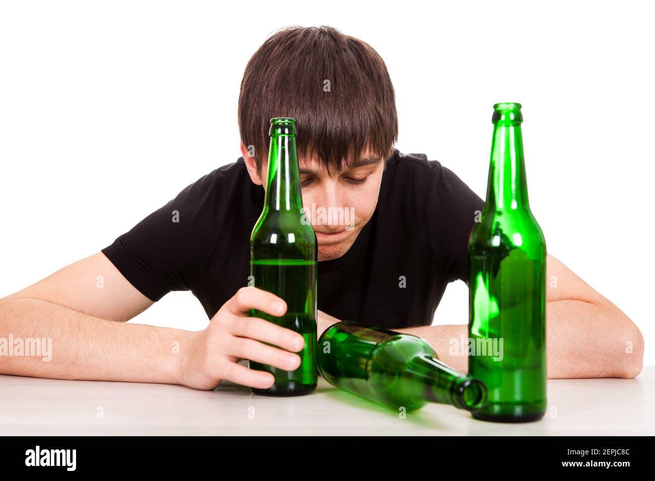 Sad Young Man in Alcohol Addiction on the White Stock Photo - Alamy