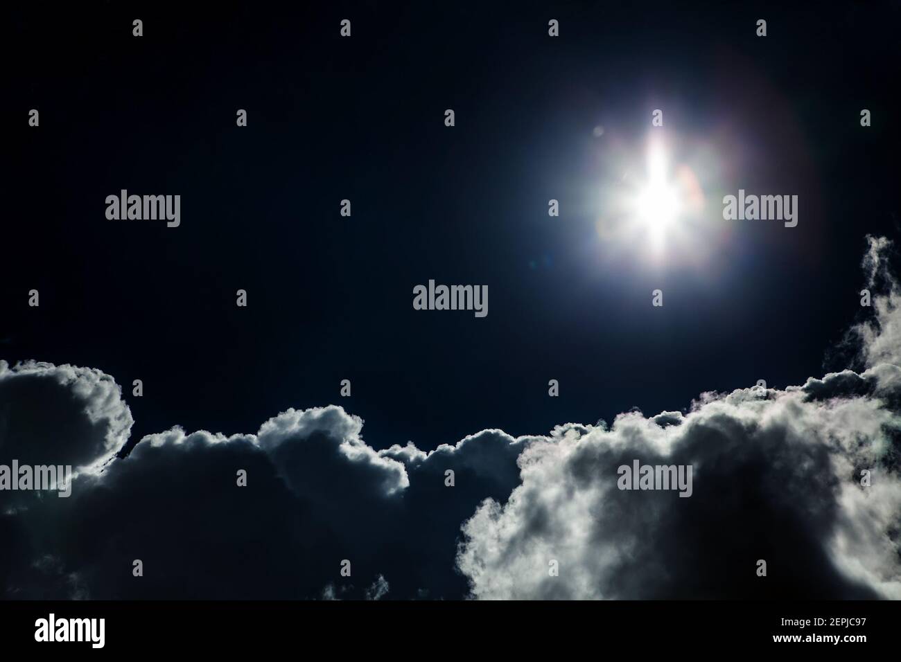 Night Sky with a Light and Dramatic Clouds Stock Photo - Alamy