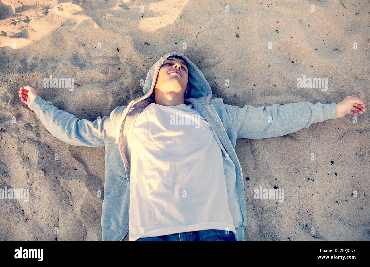 Beach sand man sleep hi-res stock photography and images - Alamy