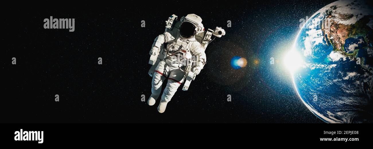 Astronaut spaceman do spacewalk while working for space station in ...
