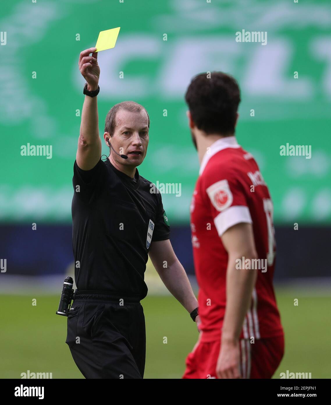 The referee brandishes yellow card hi-res stock photography and images ...