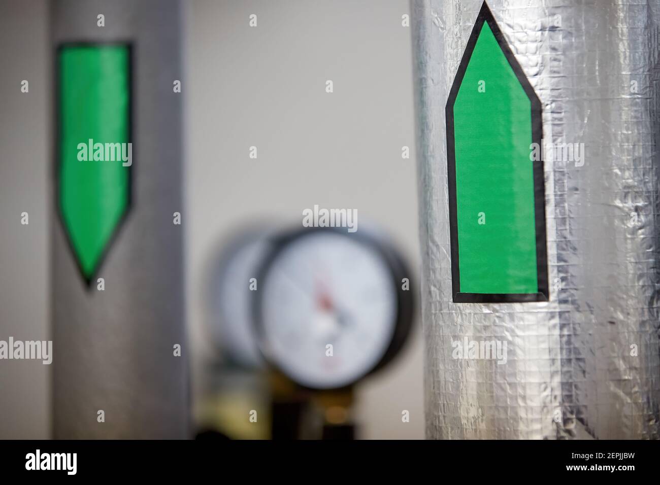Central heating network. Thermometer on the hot water supply pipe to ...