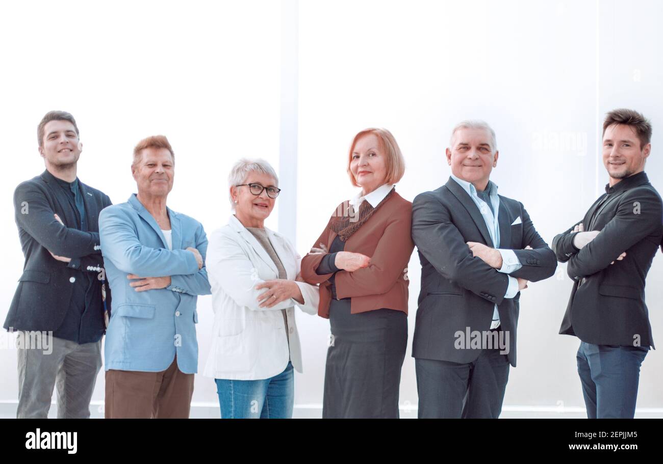 Group of business people in an office lined up Stock Photo - Alamy
