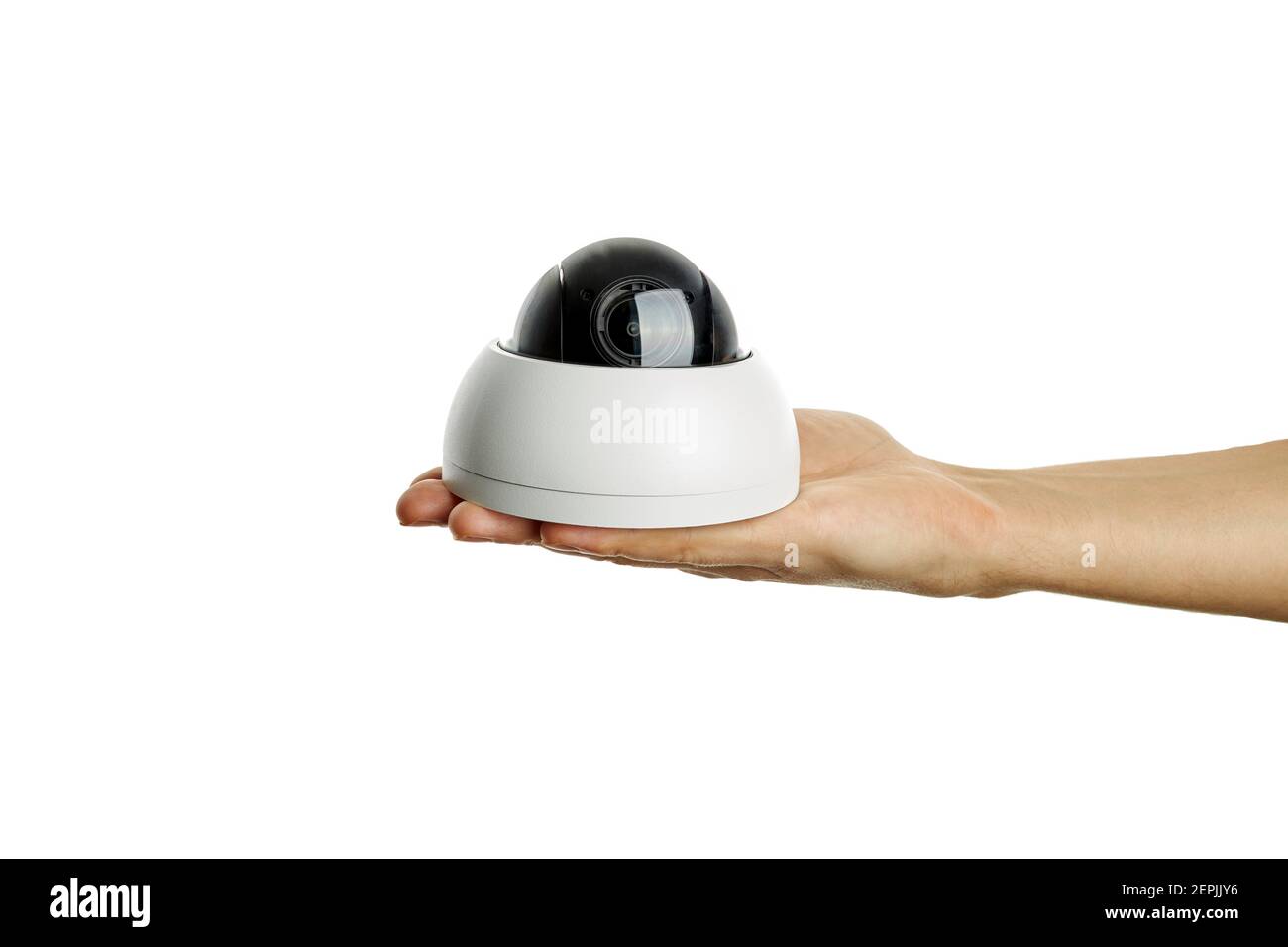 cctv surveillance camera at caucasian persons hand. isolated on a white ...