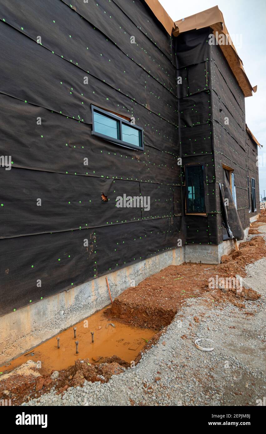 Vertical shot of the drive-thru side of a new fast food restaurant ...