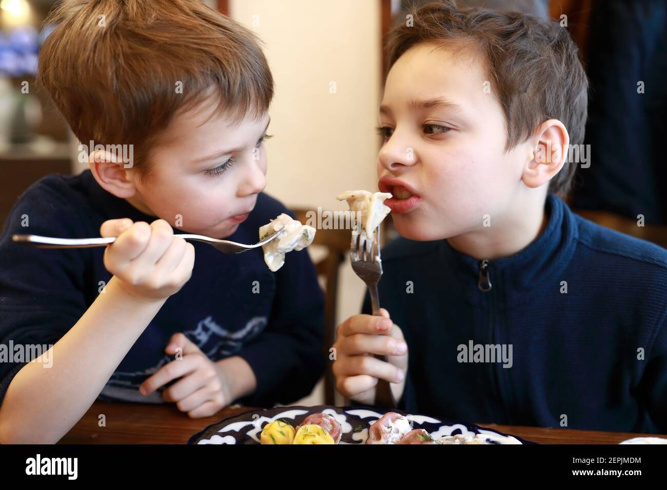 Child dumplings table in hi-res stock photography and images - Alamy