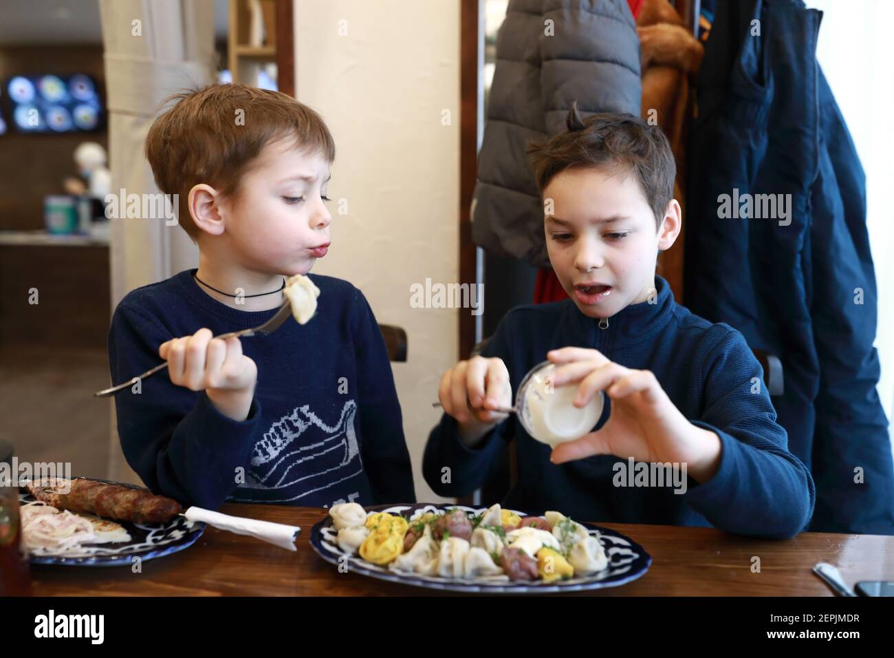 Two adorable children boy brothers hi-res stock photography and images ...