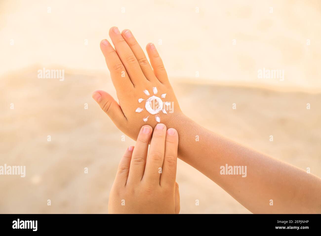 Sunscreen on the skin of a child. Selective focus. nature Stock Photo ...