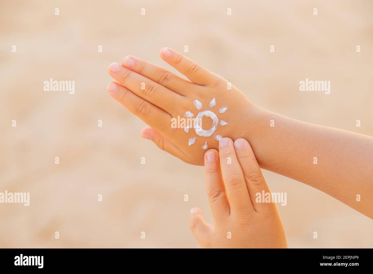 Sunscreen on the skin of a child. Selective focus. nature Stock Photo ...