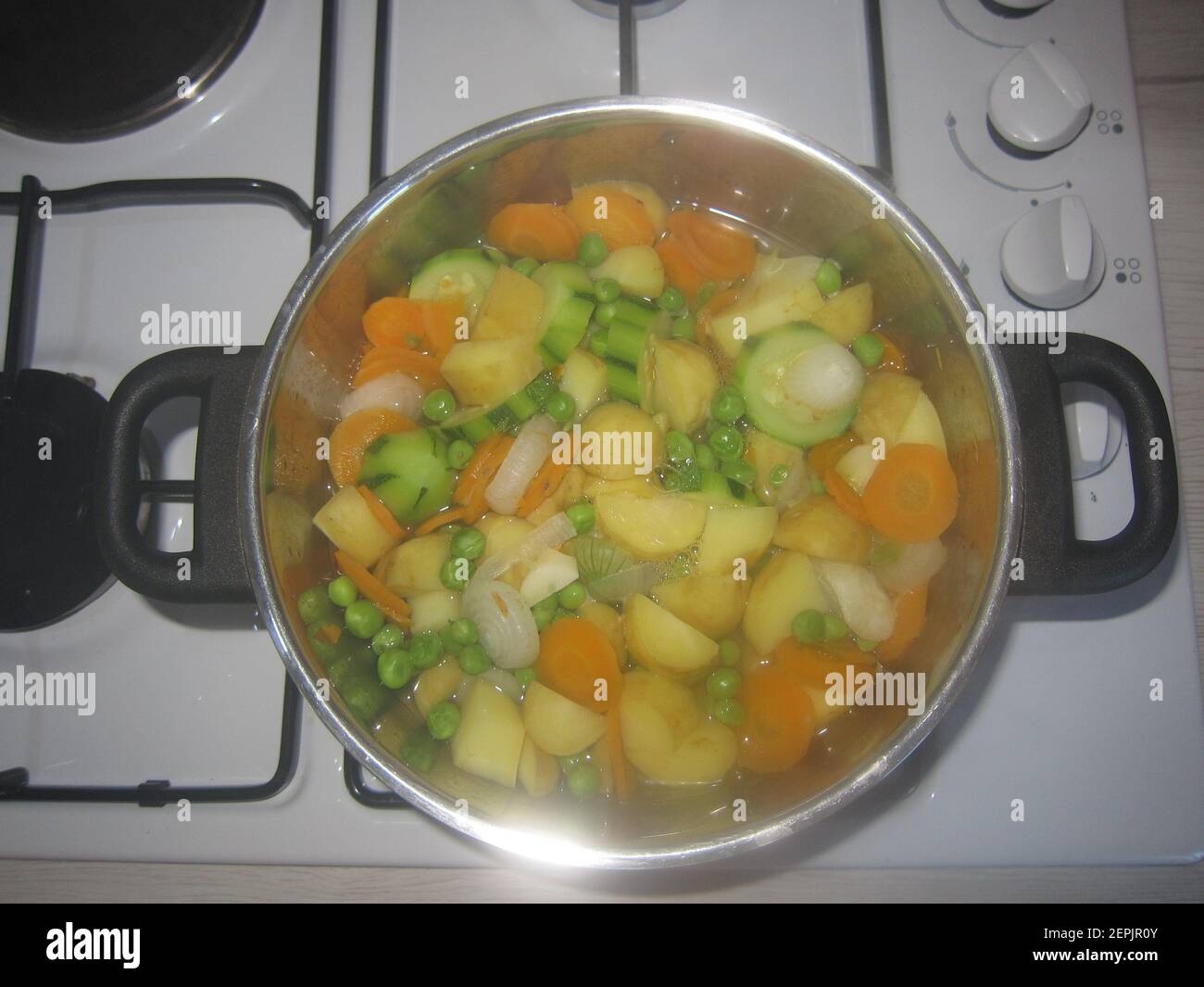 Vegetable pot cooking in a pan Stock Photo - Alamy