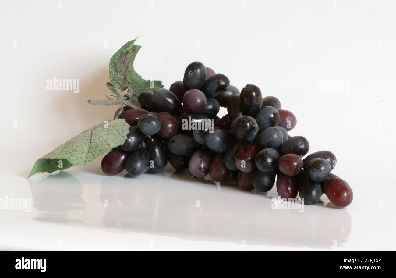 Still Life with ripe grapes on a white background Stock Photo - Alamy