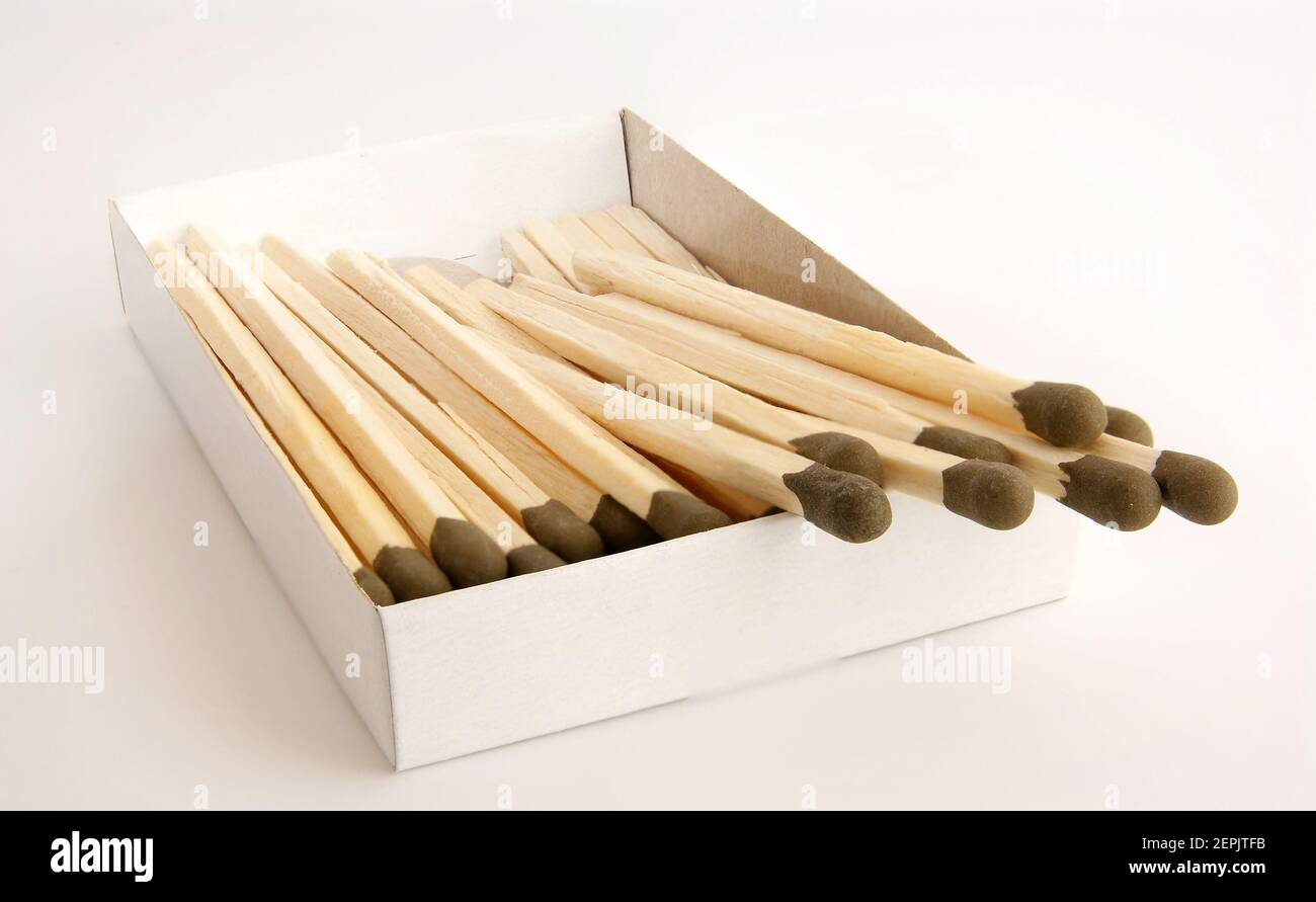 Big matches with brown heads closeup on white background Stock Photo ...