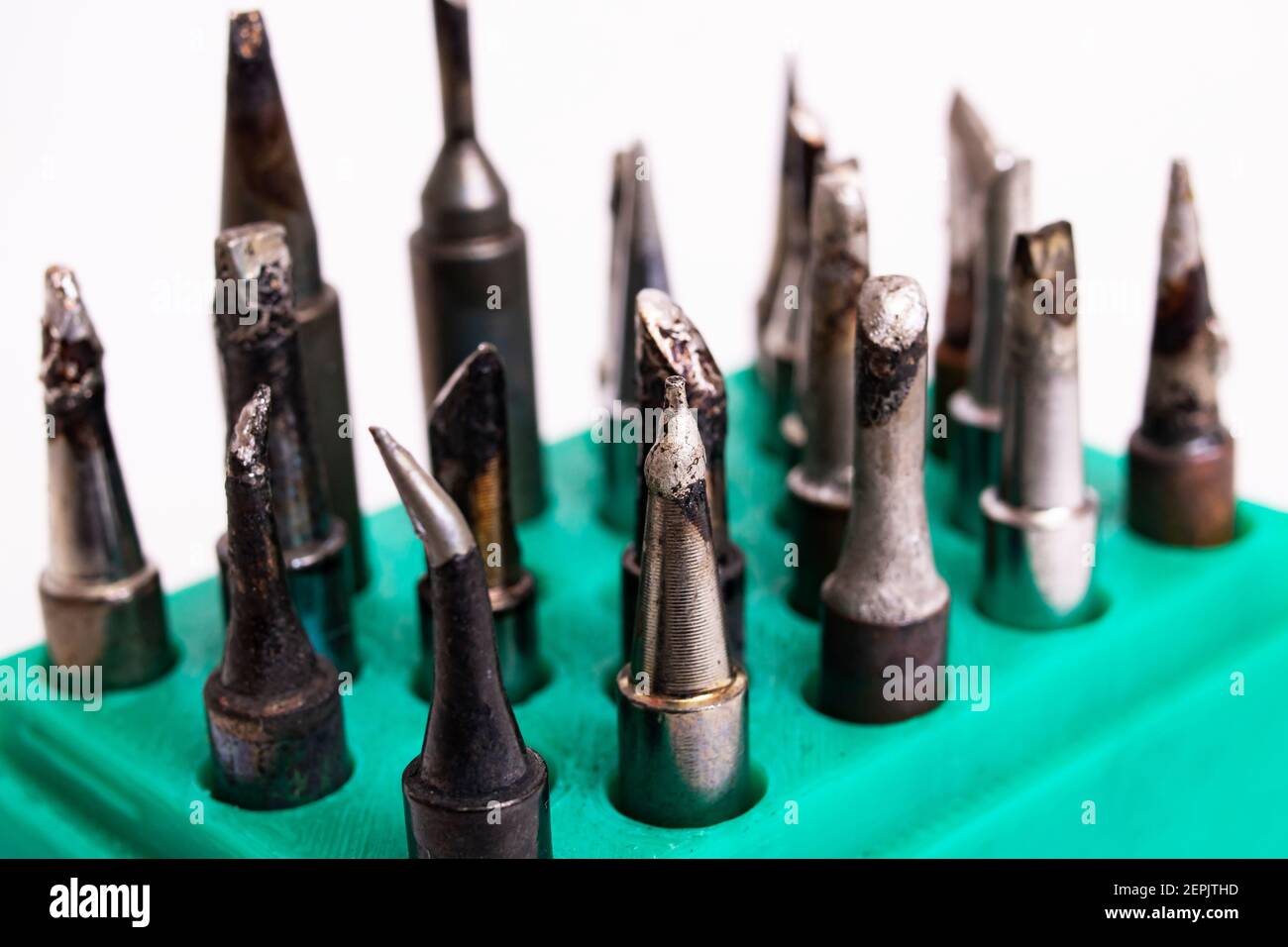 Soldering iron tips box on a white background Stock Photo - Alamy