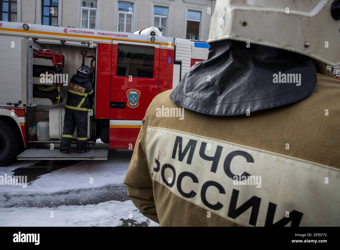 Moscow, Russia. 27th of February, 2021 Firefighters extinguish a fire ...