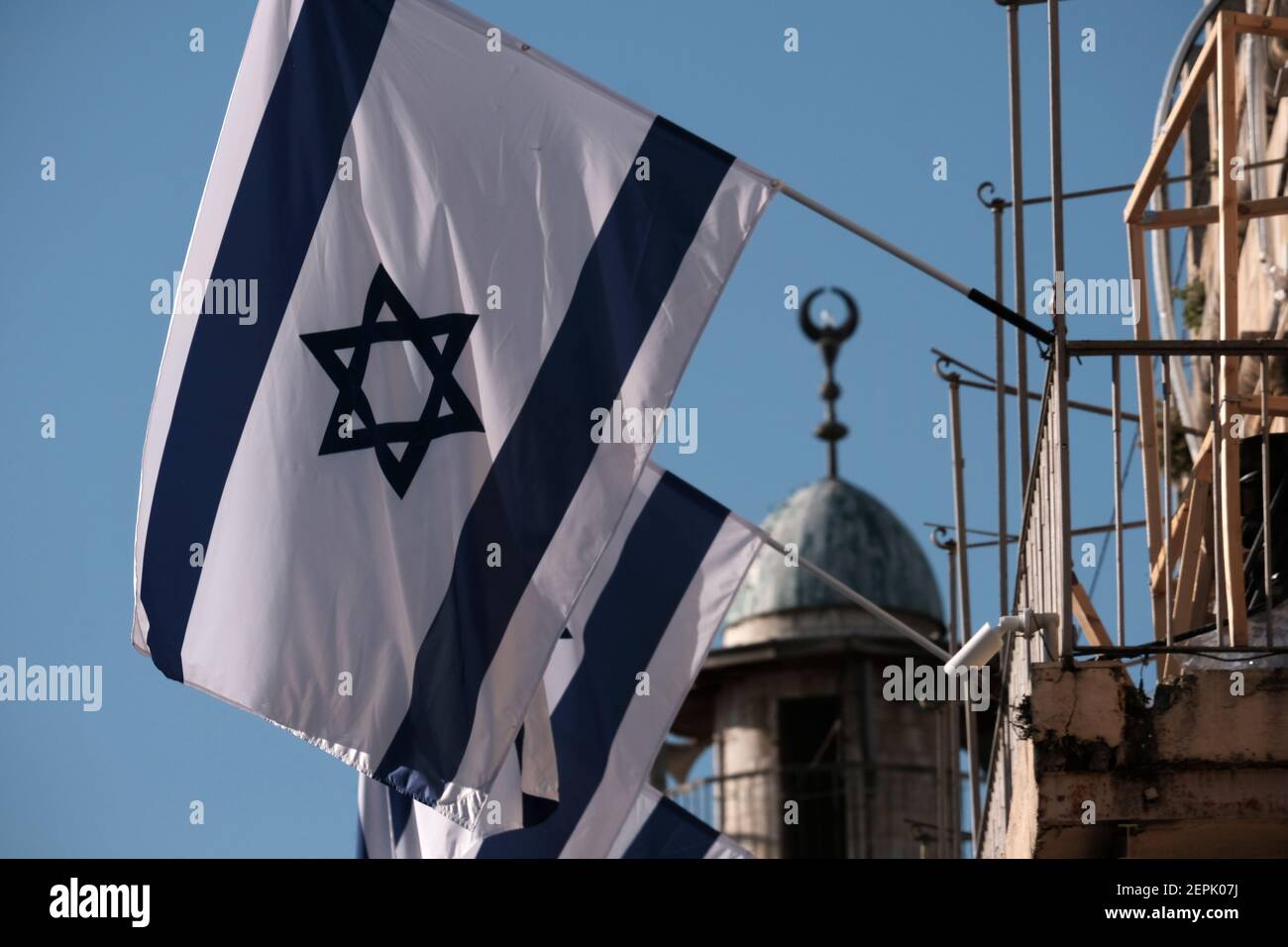 Israeli flags hanging from a house Jewish settlers took over in Al Wad ...