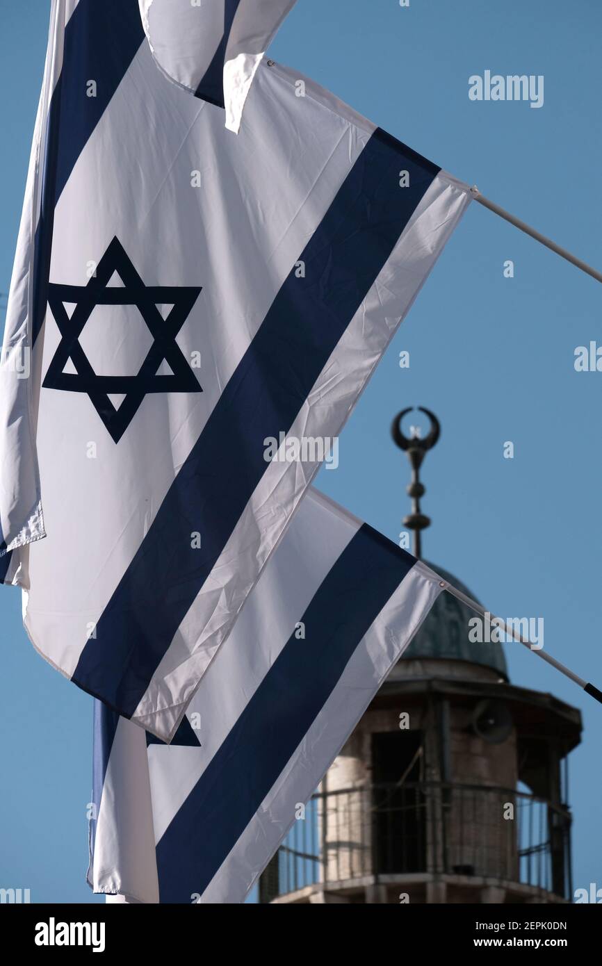 Israeli flags hanging from a house Jewish settlers took over in Al Wad ...