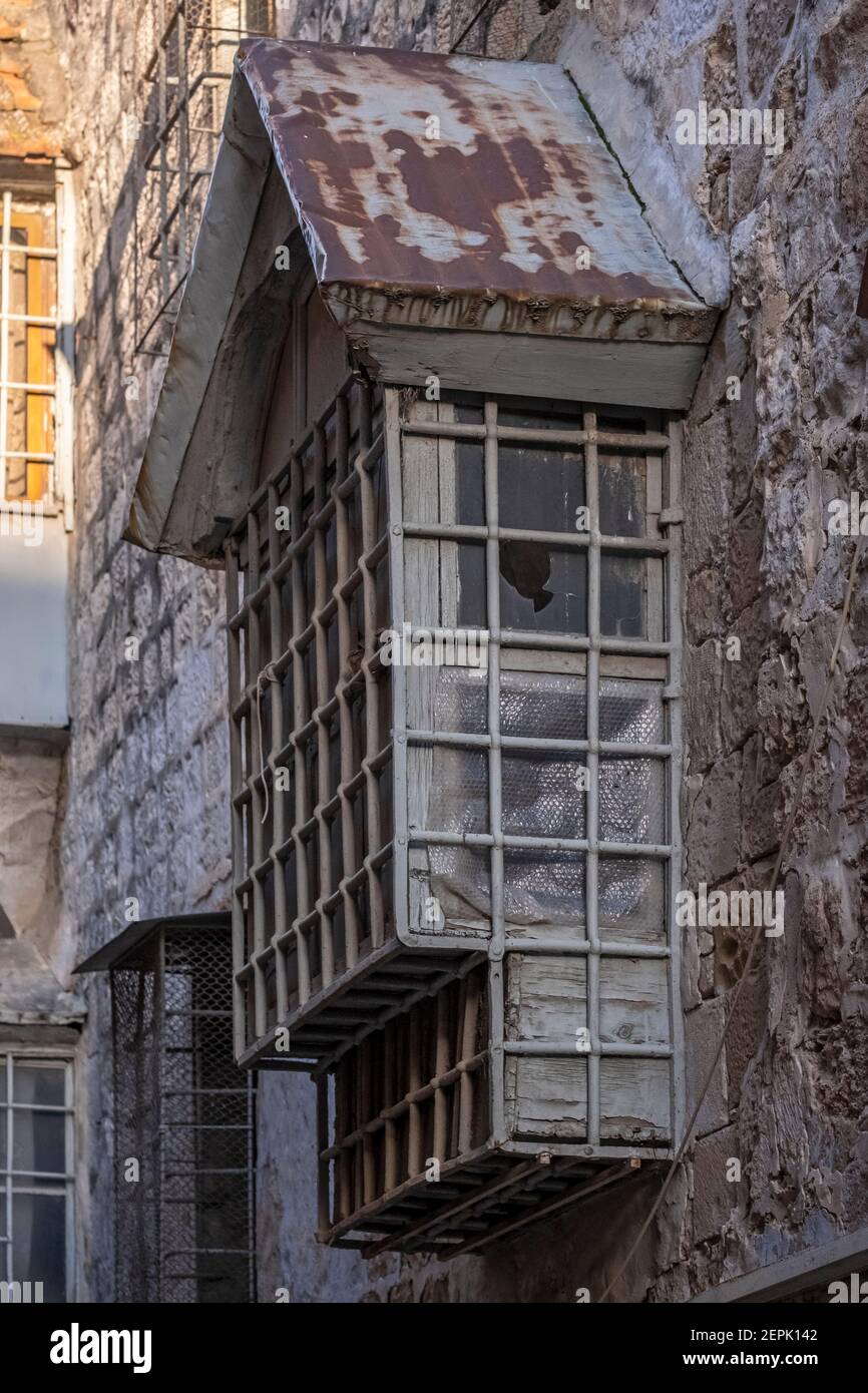 Oriel window at the Greek orthodox Patriarchate street in the Christian ...