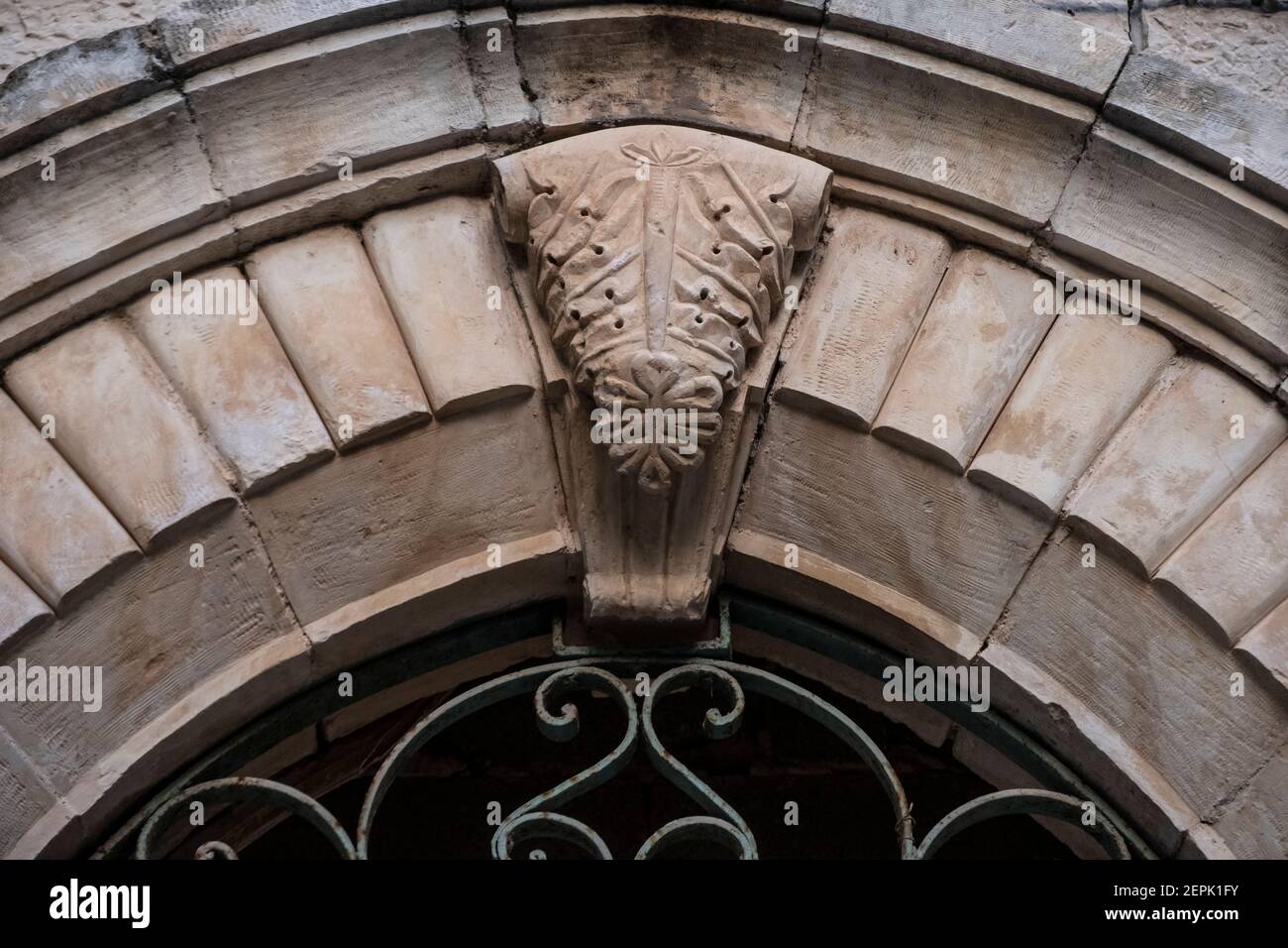 Decorative keystone in a doorway of an Arab house which was abandoned ...