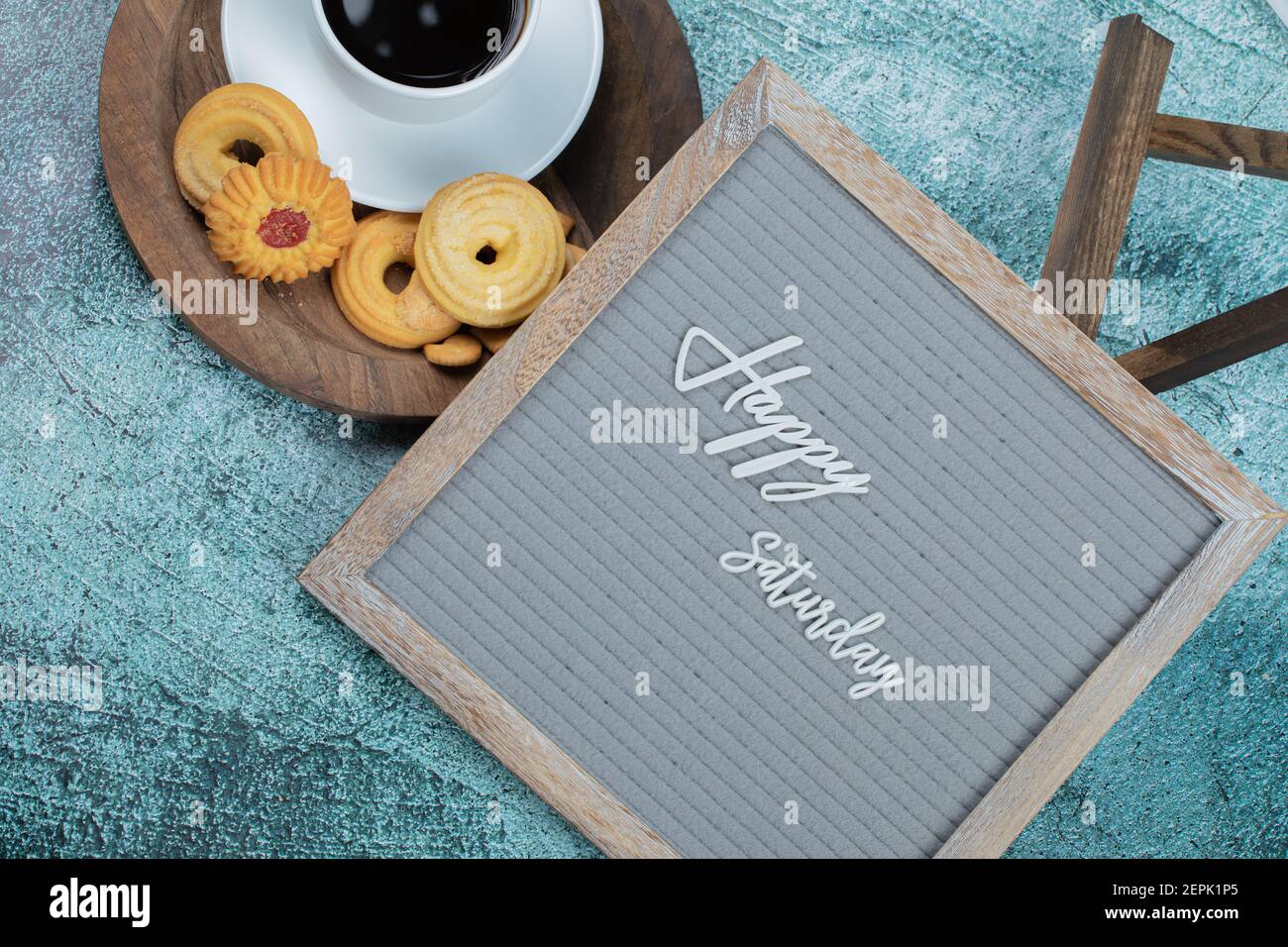 Happy saturday poster embedded on grey background with cookies Stock ...
